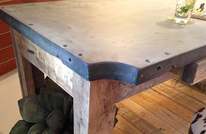 Industrial bar table made of recycled wood and repurposed billiard slate